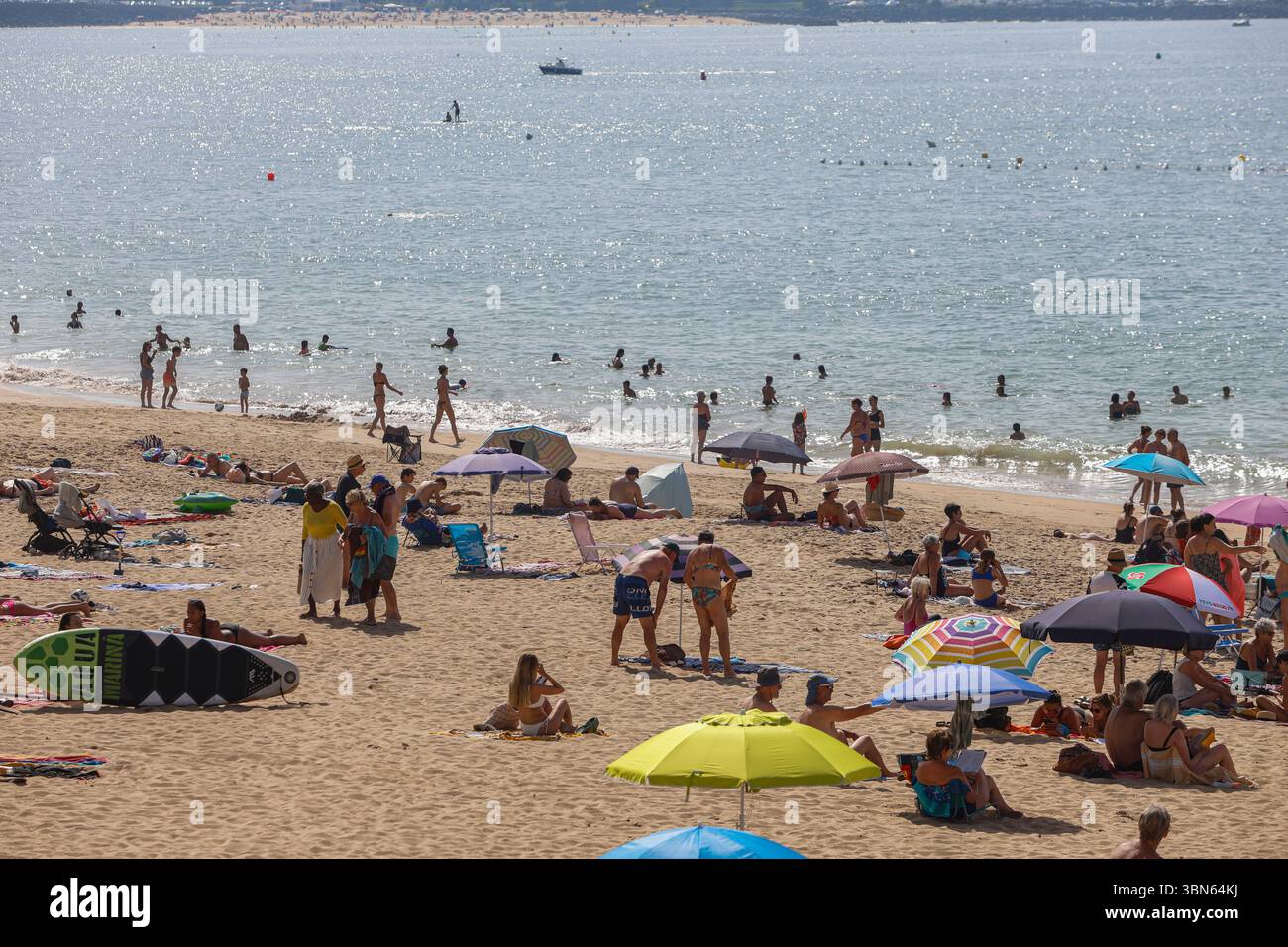 Beachgoers enjoy the beach Monday, June 30, 2025 in Saint-Jean-de-Luz ...