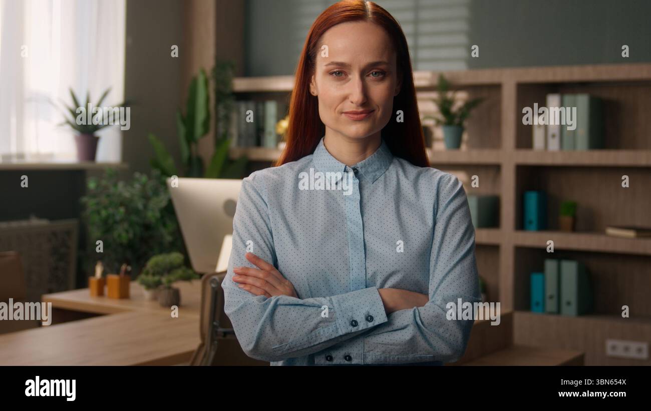 Businesswoman in office Caucasian girl posing crossed hands confident ...