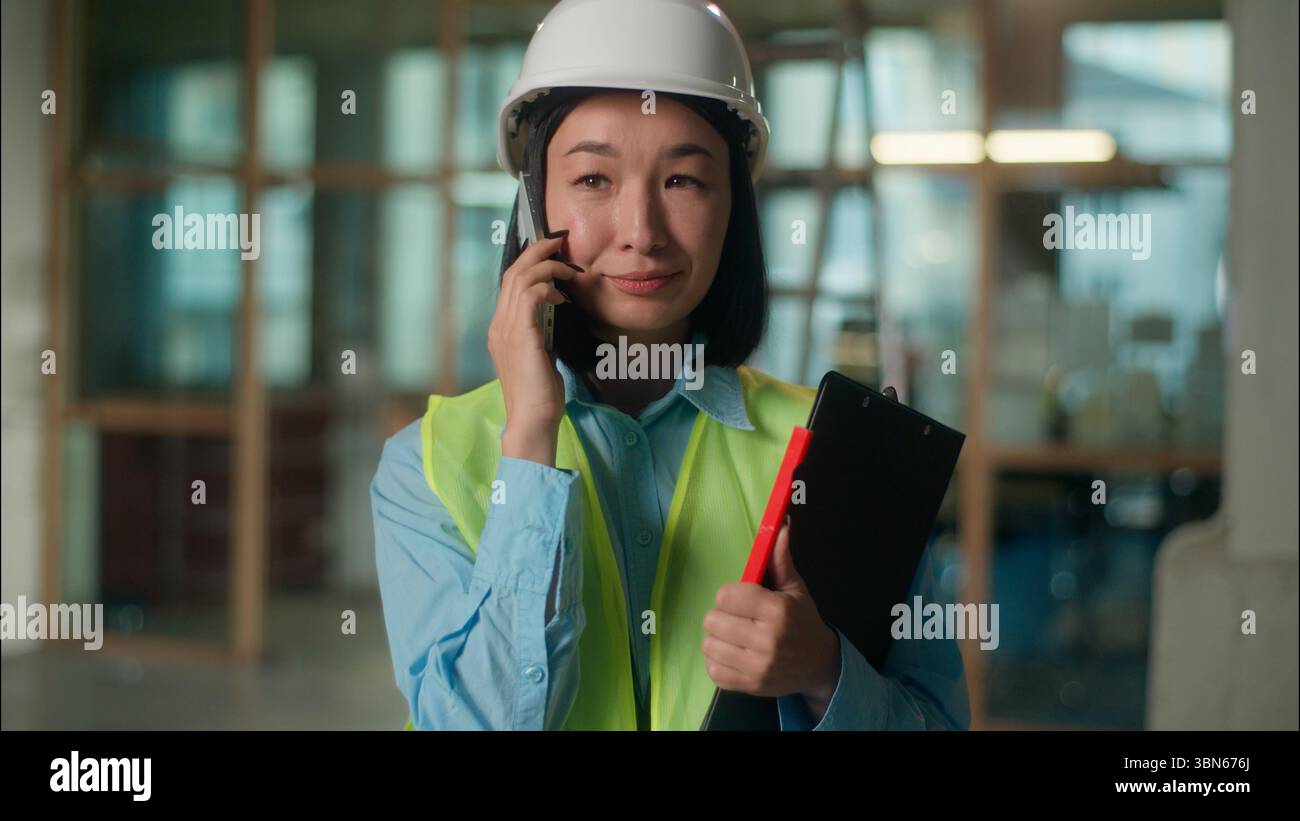 Asian woman builder architect Chinese engineer master technician ...