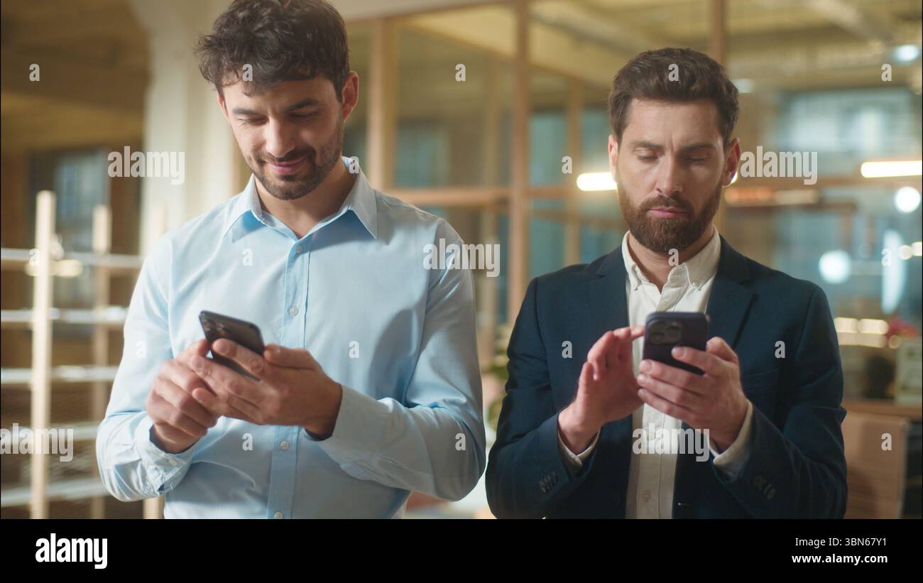 Two office managers typing email hi-res stock photography and images ...