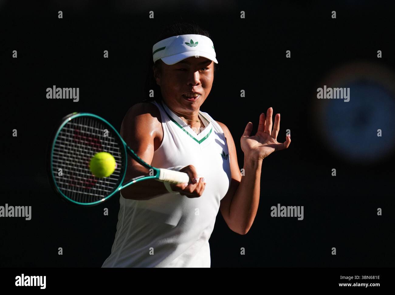 Mingge Xu during her match against Emma Raducanu on day one of the 2025 ...