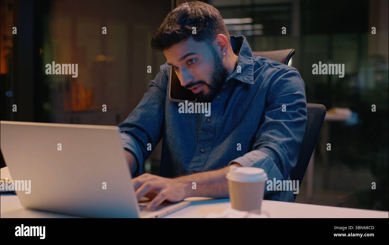 Businessman Indian guy multitasking business man male in night late ...