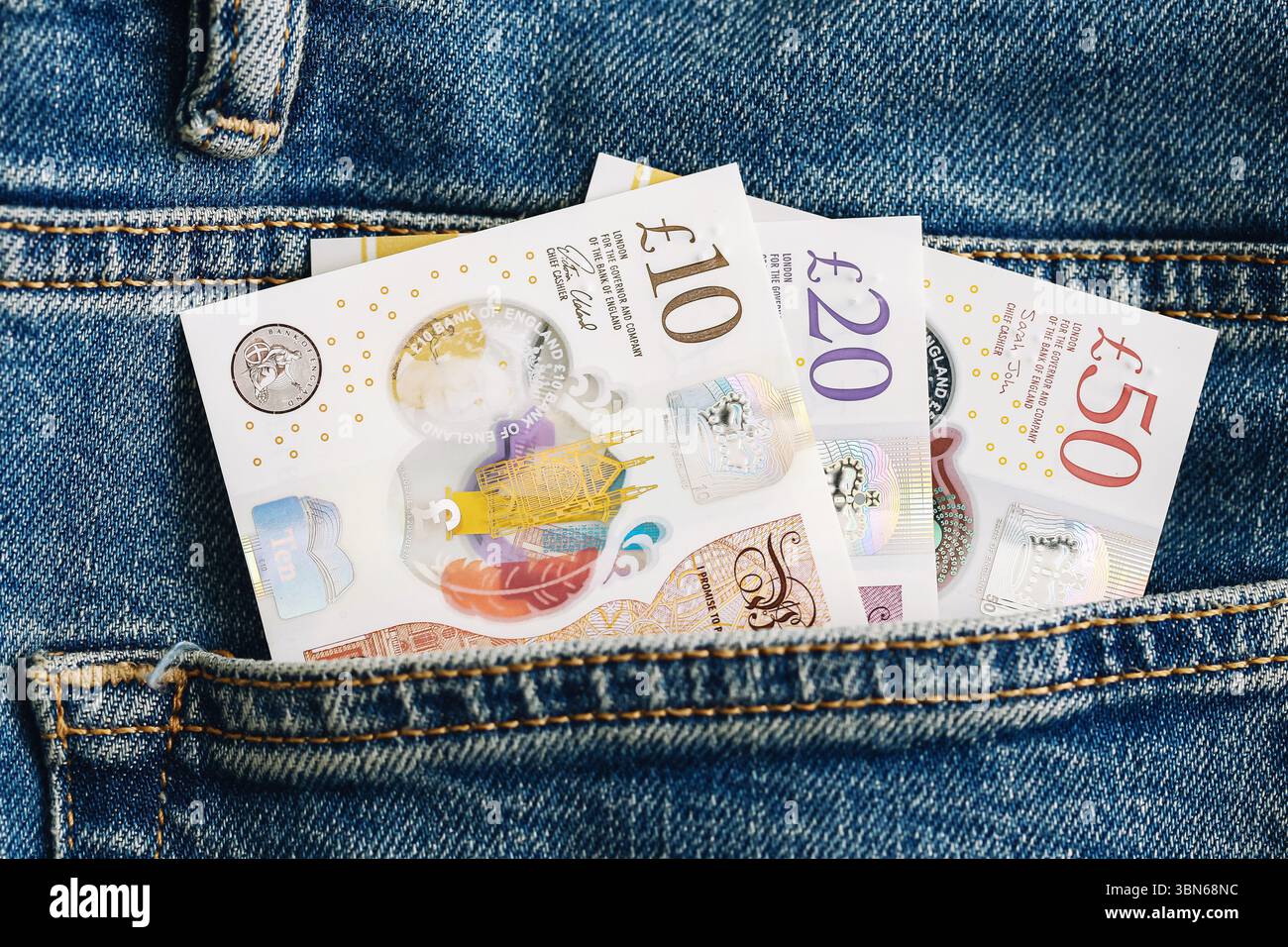 Folded banknotes british hi-res stock photography and images - Alamy