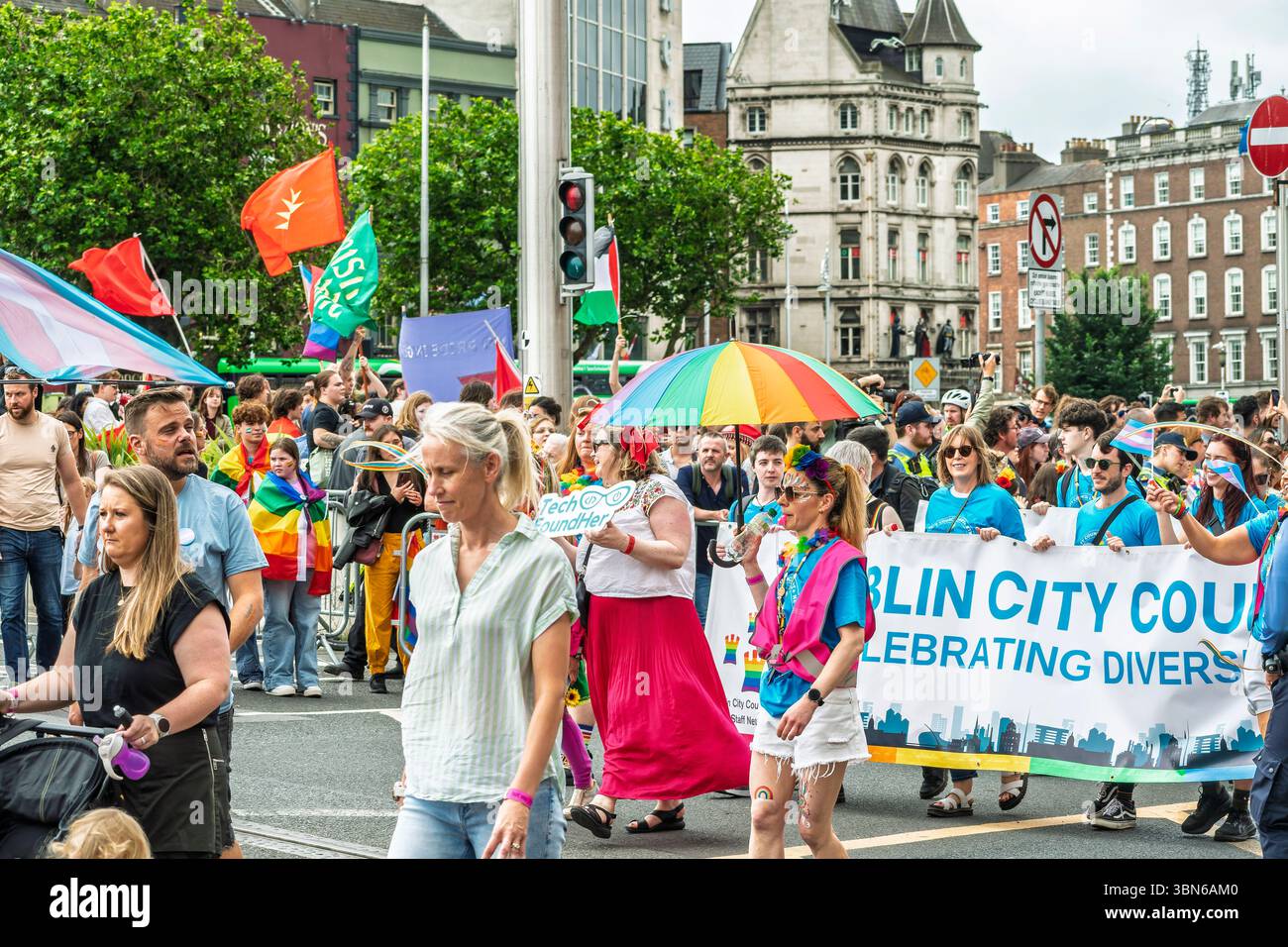 A Pride marchers in vibrant rainbow colors celebrating 10 years of marriage equality at Dublin ...