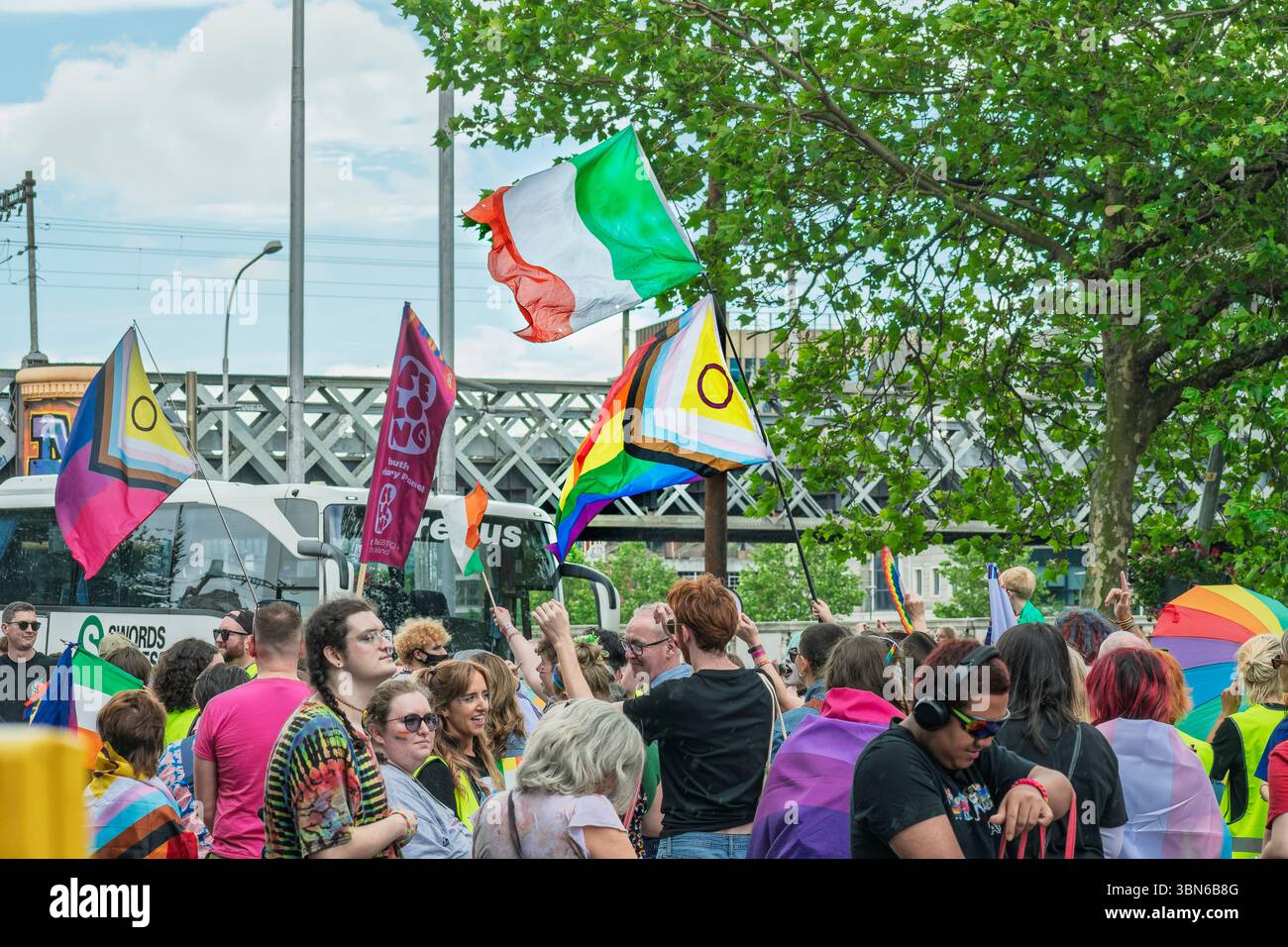 A Pride marchers in vibrant rainbow colors celebrating 10 years of ...