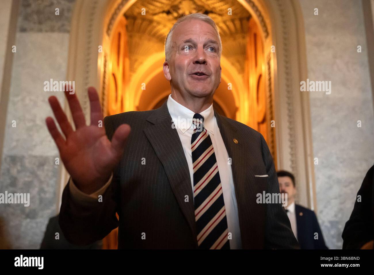 Sen. Dan Sullivan, R-Alaska, speaks to reporters as Republicans begin a ...