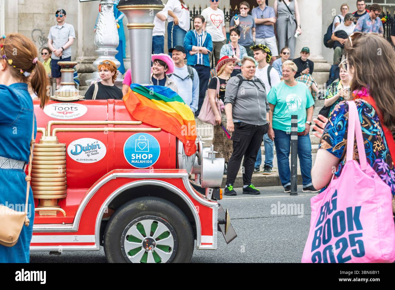 A Pride marches with a vibrant rainbow colors steam train celebrating ...