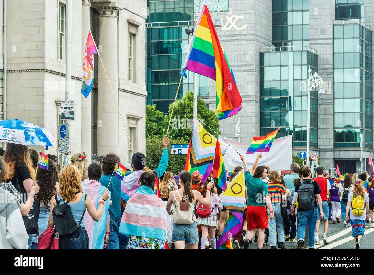 A Pride marchers in vibrant rainbow colors at Custom House Quay, 10 ...