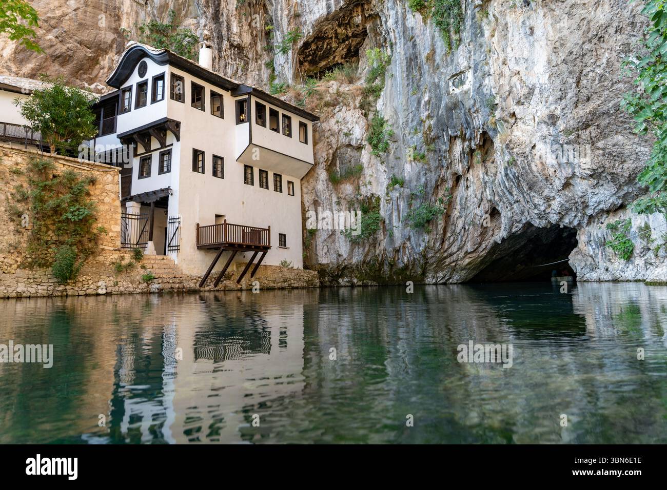 Historic Dervish monastery by river at Blagaj spring, Bosnia Stock ...