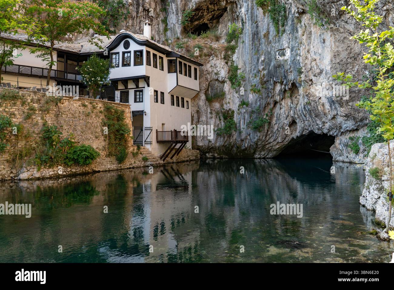 Historic Dervish monastery by river at Blagaj spring, Bosnia Stock ...