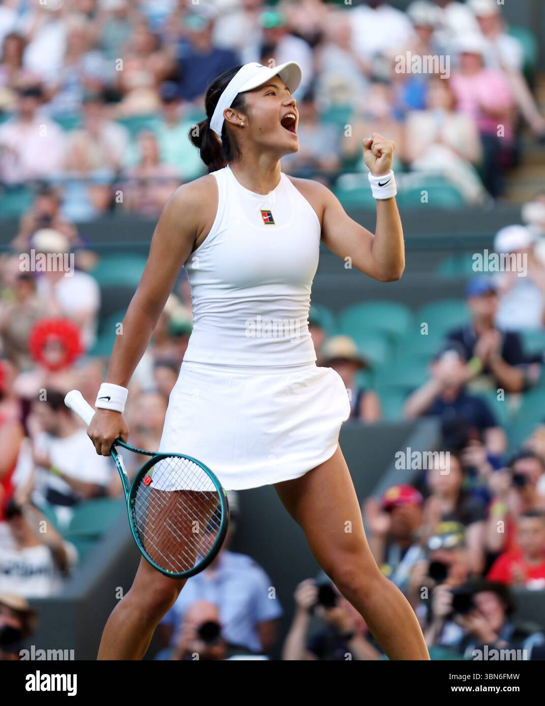 Britain's Emma Raducanu celebrates victory over Britain's Mingge Xu on ...