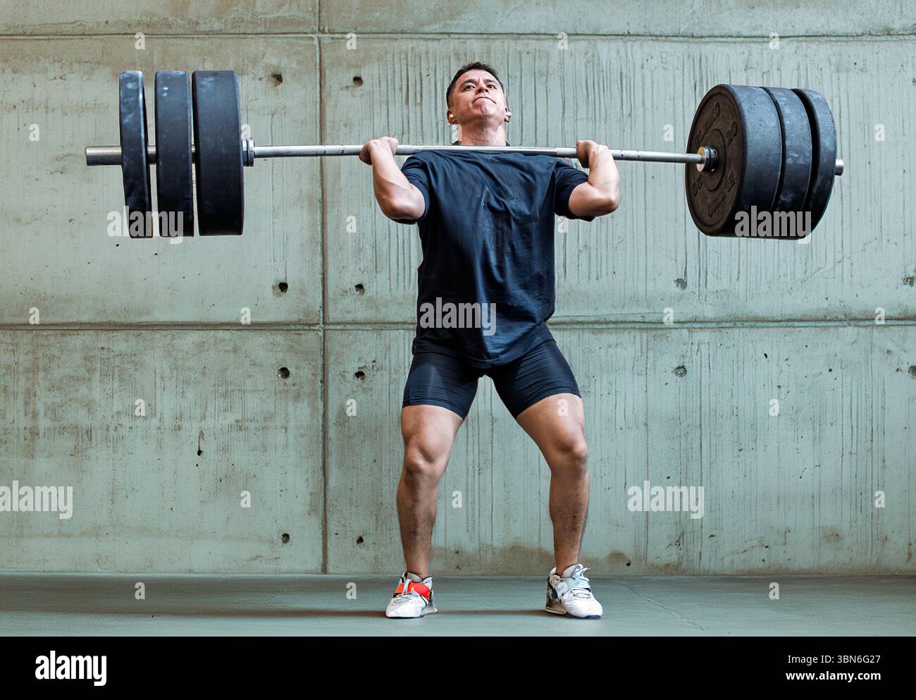 Determined athlete lifts hi-res stock photography and images - Alamy
