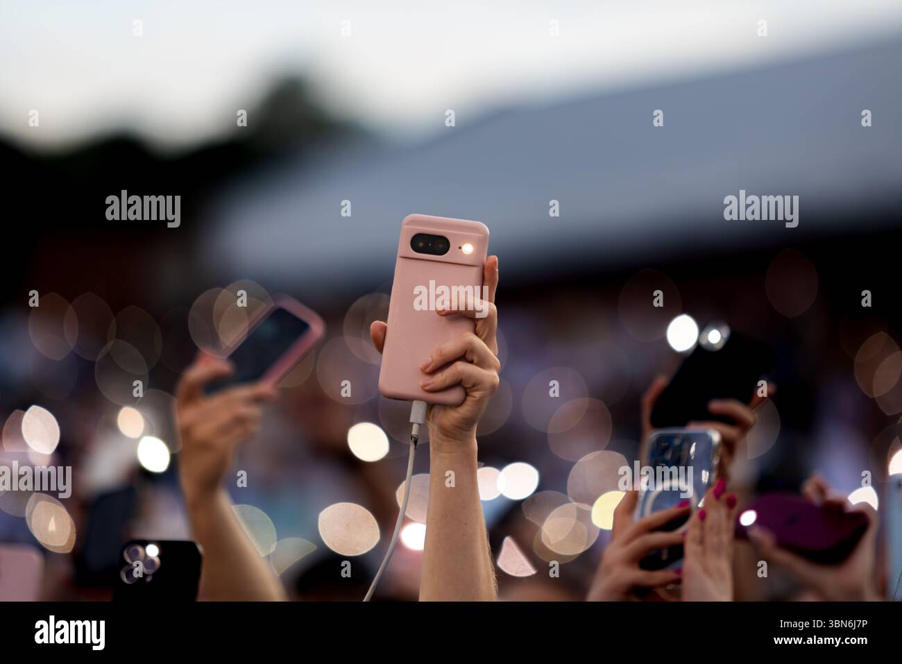 Concert Crowd, Recording on Smartphones Stock Photo - Alamy