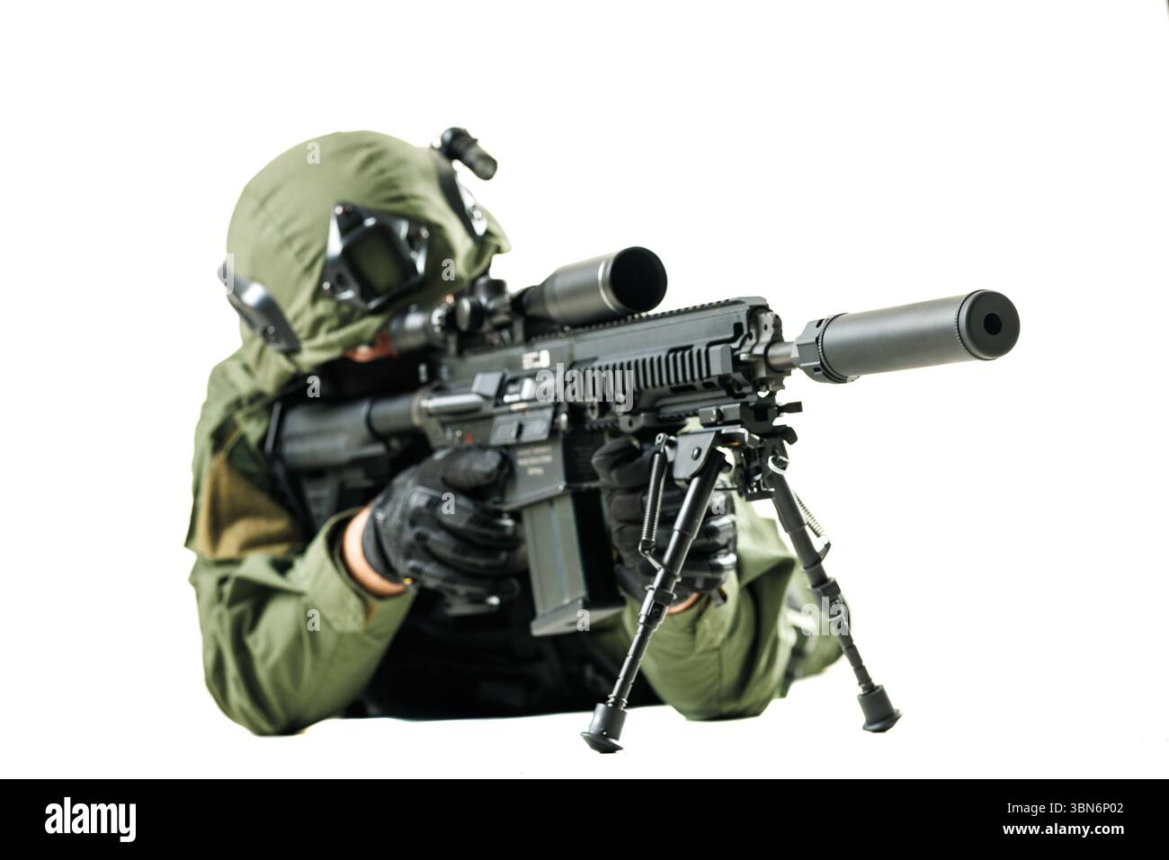 Special forces soldier in action, aiming his precision rifle. Tactical ...