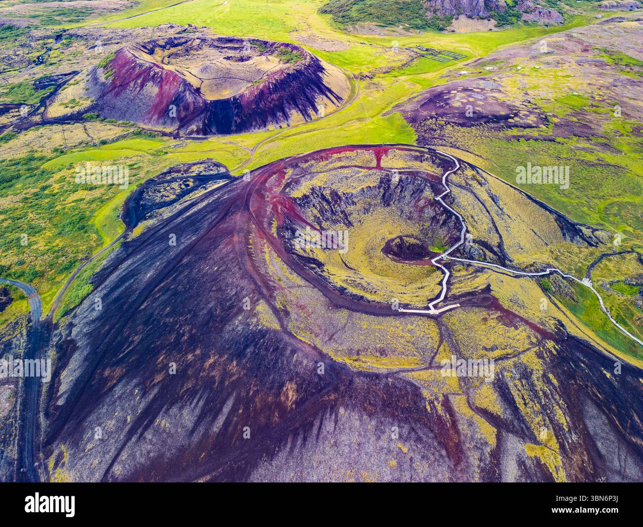 Aerial drone view of the Grabrok Volcano crater in Iceland during ...