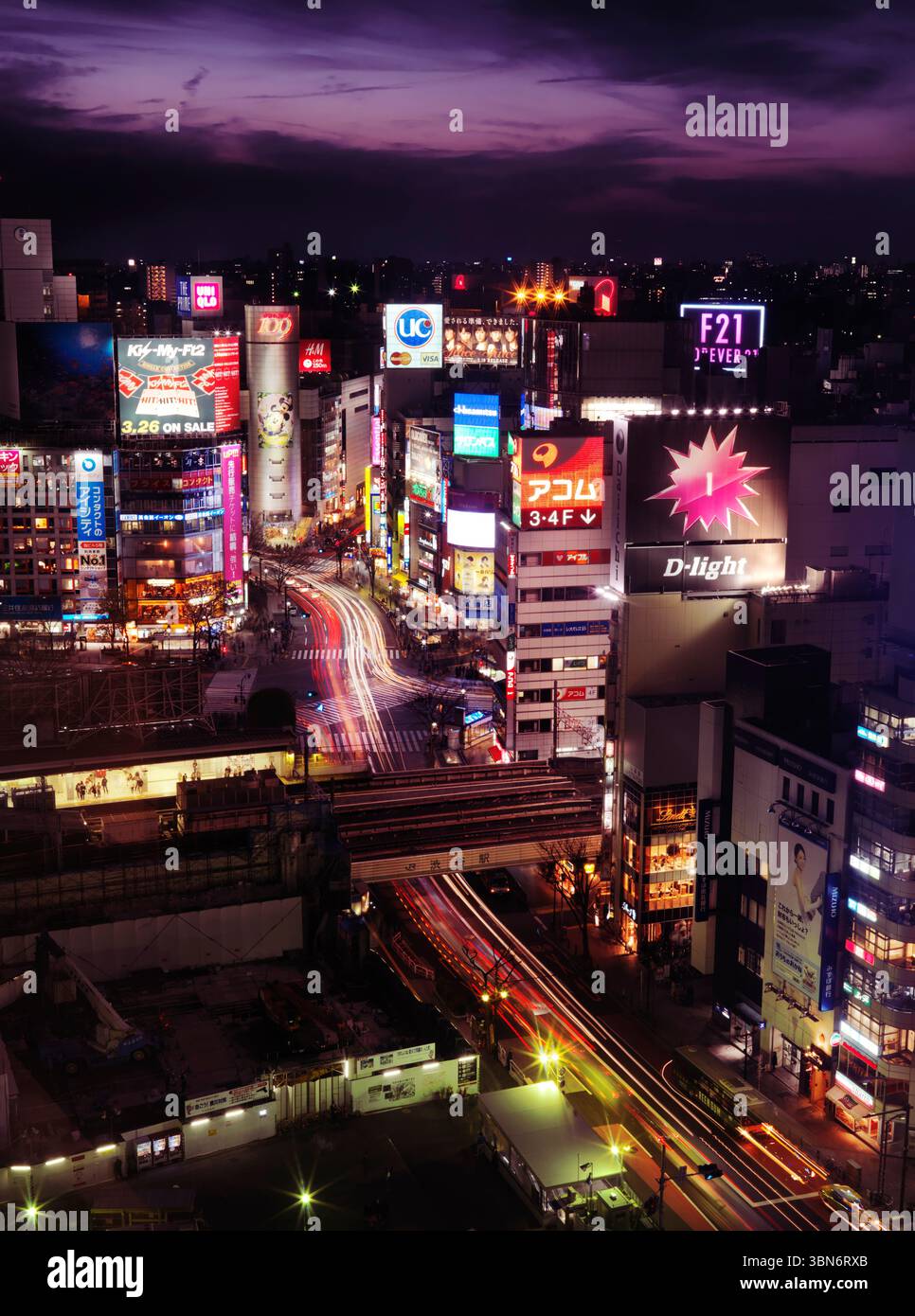 Shibuya station in Tokyo, colorful aerial night city scenery. Meiji ...