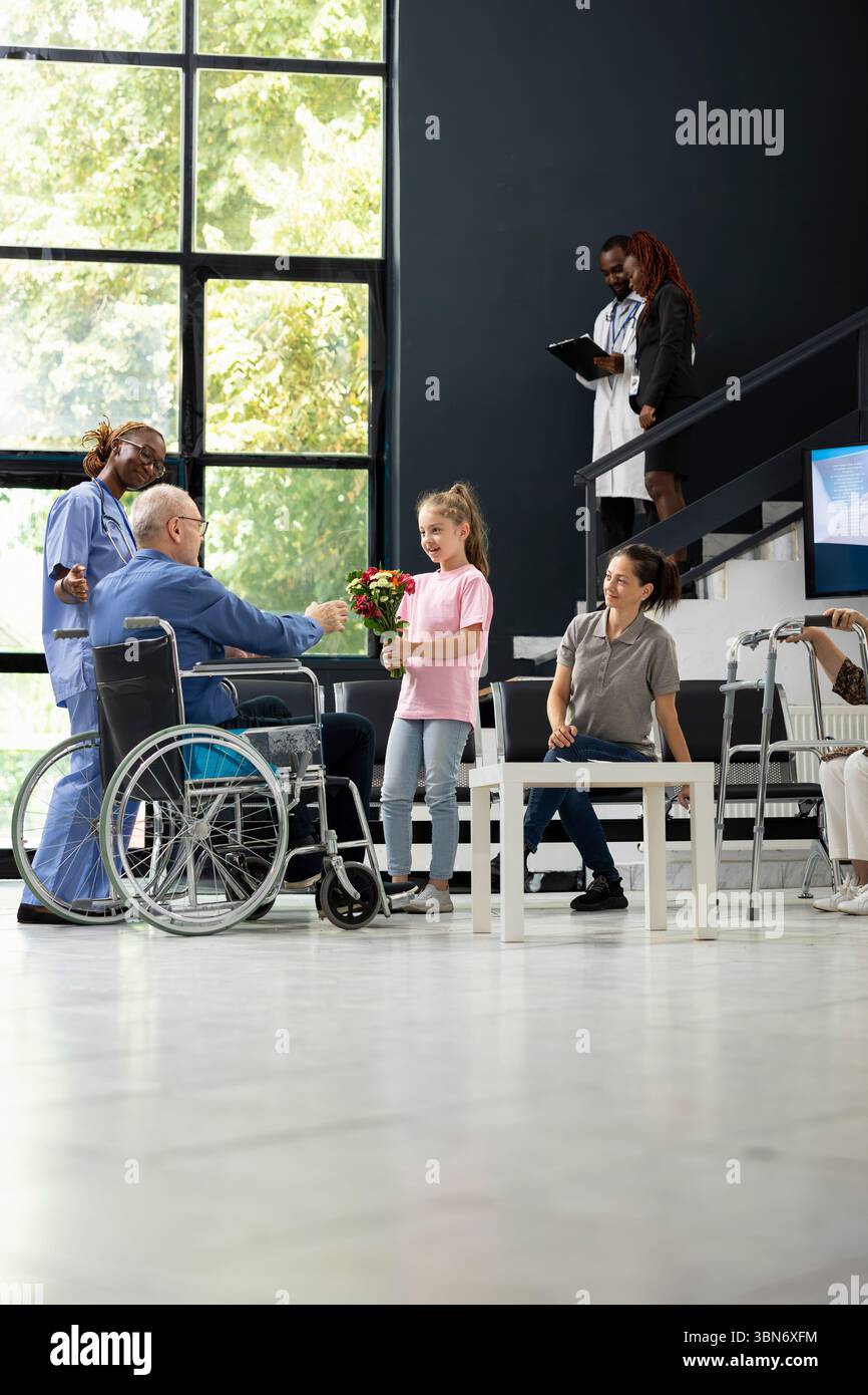 Child brings flowers disabled hi-res stock photography and images - Alamy