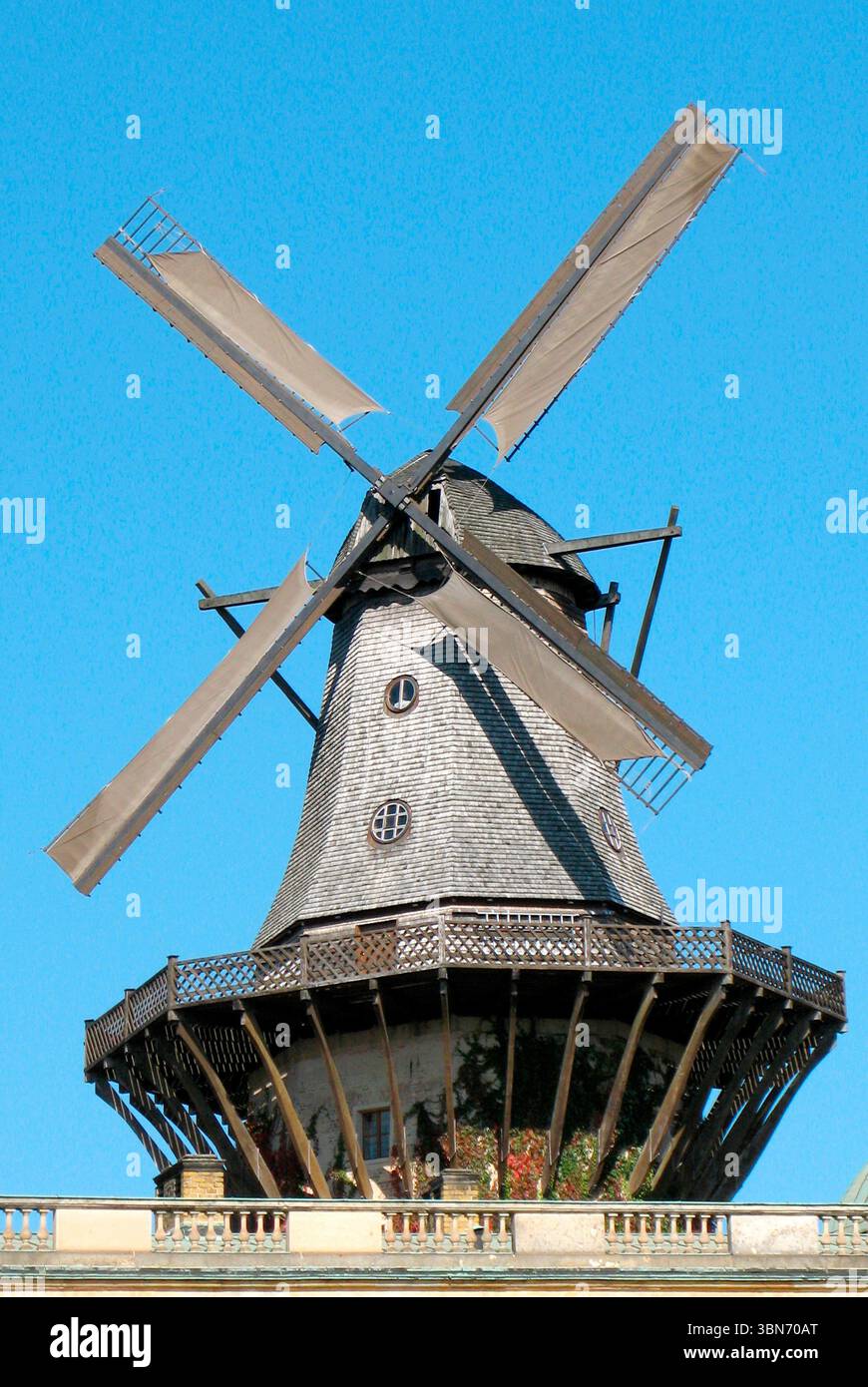 Historical windmill in the palace garden of Sanssouci in Potsdam ...