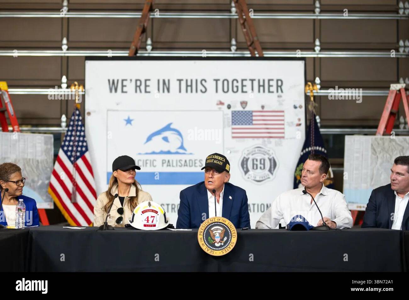 President Donald Trump speaks with local leaders at a wildfire recovery ...