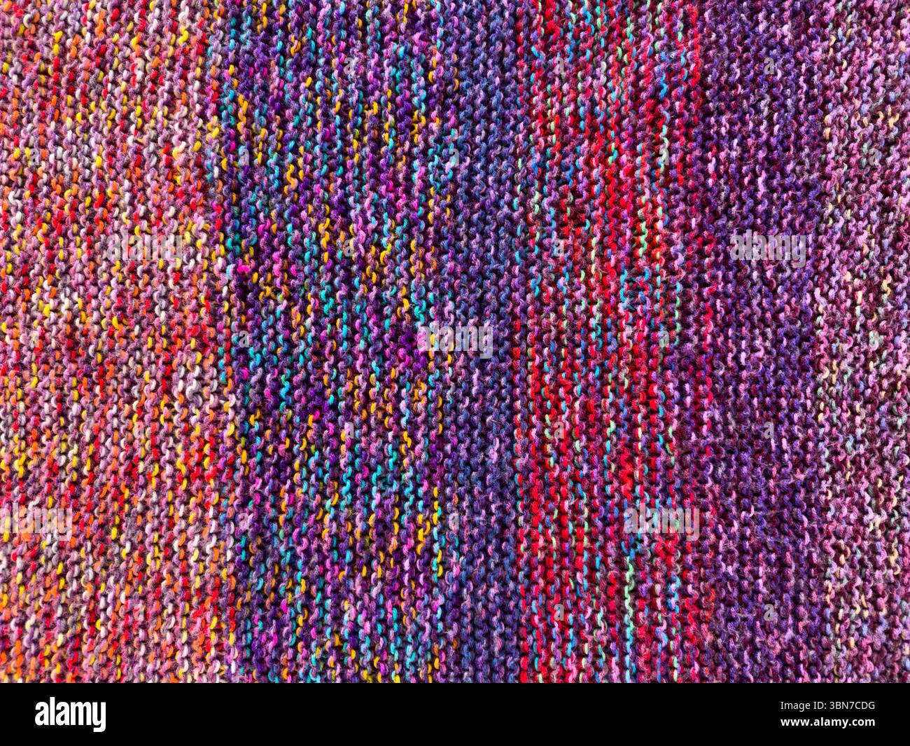 Woolen yarn of different colours knitted using garter stich as detailed ...