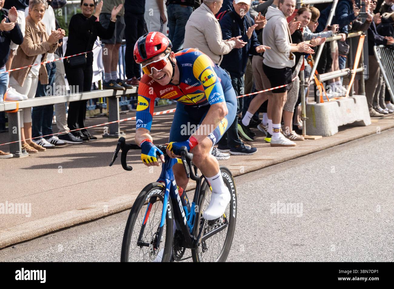 Søren Kragh Andersen of Lidl-Trek crosses the finish line as the winner ...