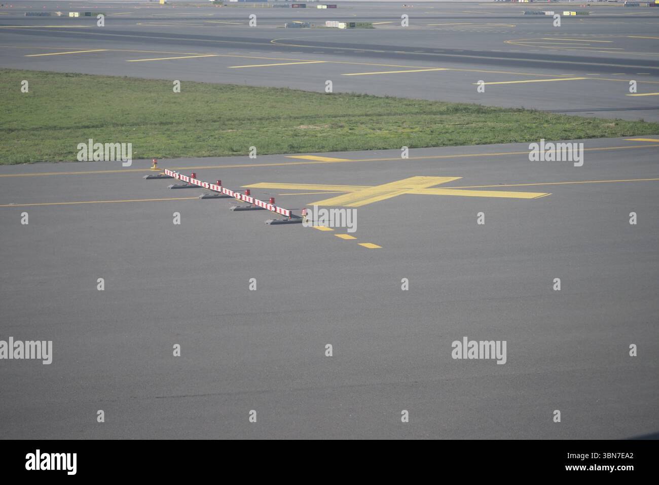 Markings on an airport runway guide aircraft movements Stock Photo - Alamy