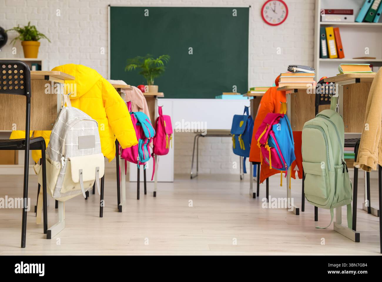 School desks stationery backpacks hi-res stock photography and images ...