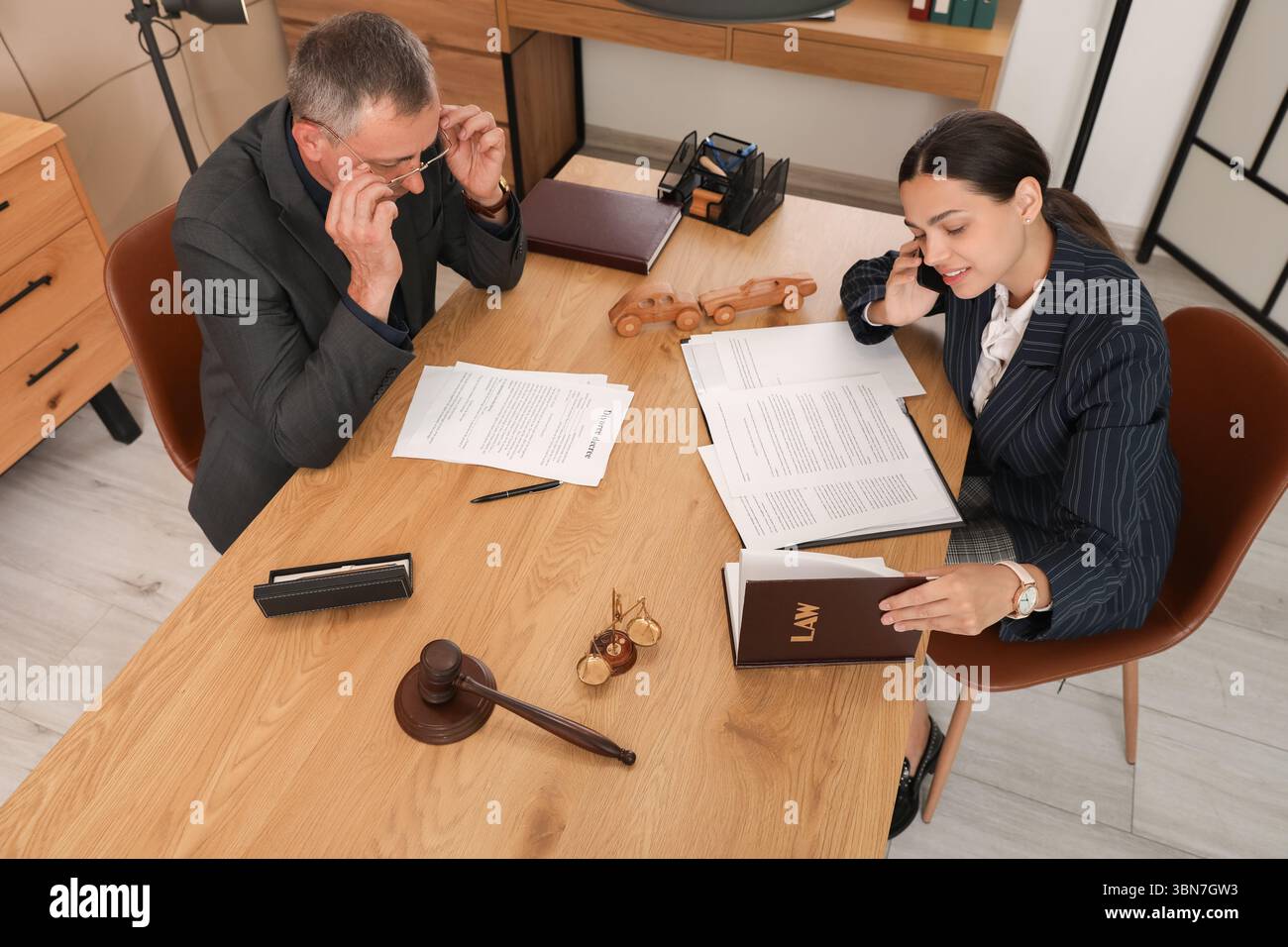 Lawyers holding meeting table hi-res stock photography and images - Alamy