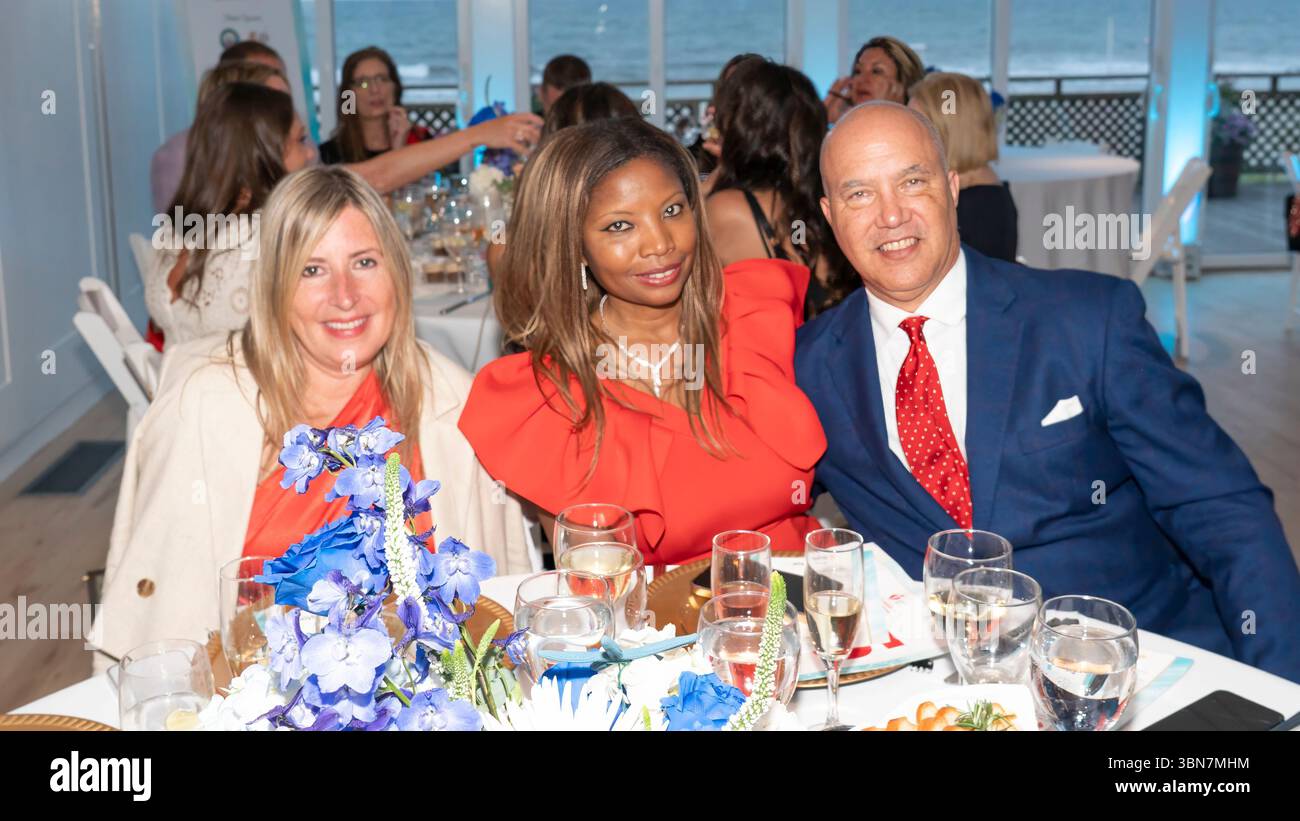 Andrea Bartzen, Maggie Delaney and Hubert Delaney attends the American ...
