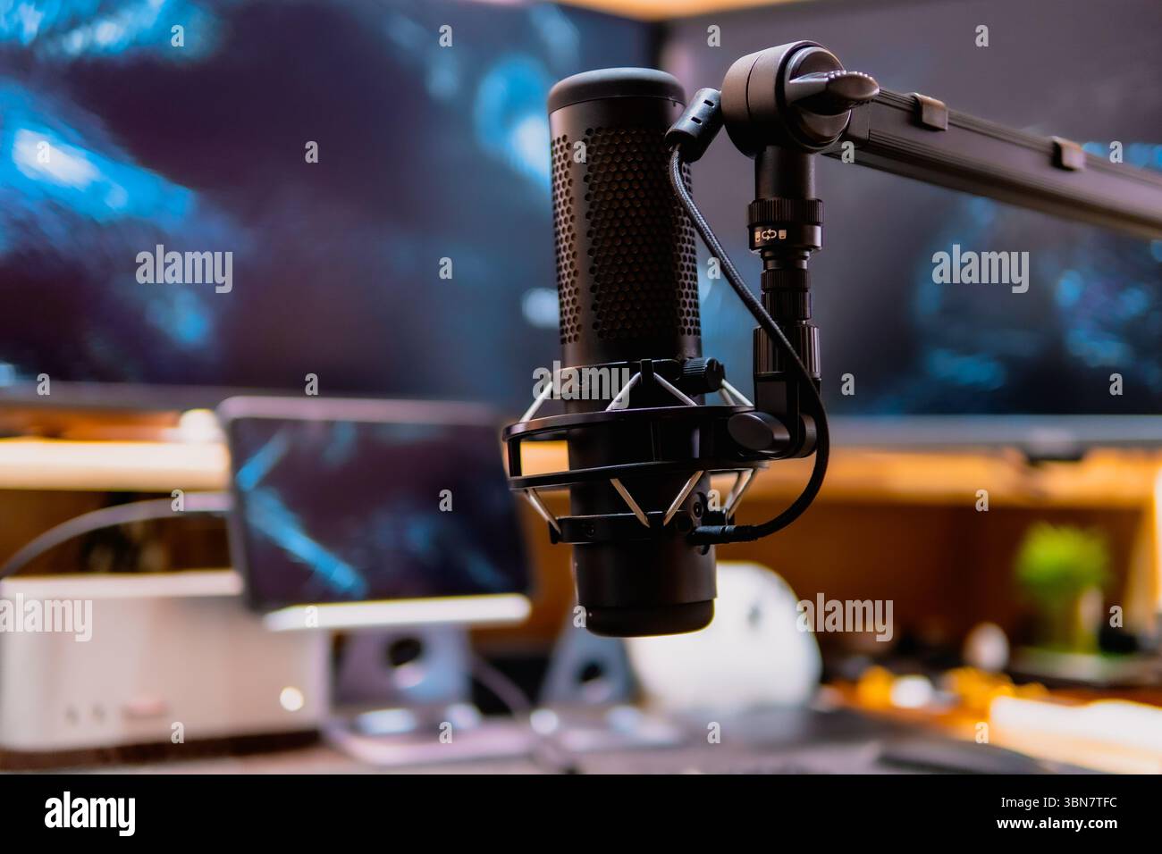 Stylish computer desk setup with dual monitors, a microphone, DAC/AMP ...