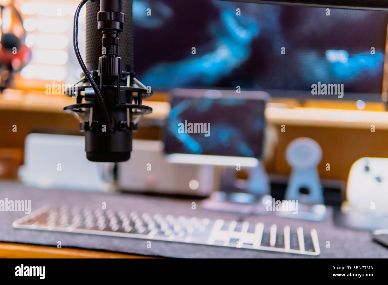 Stylish computer desk setup with dual monitors, a microphone, DAC/AMP ...