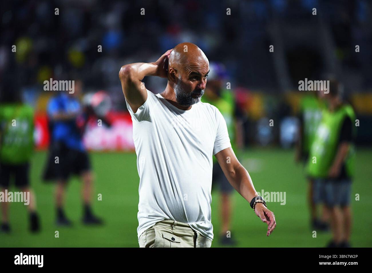 Manchester City Head Coach Pep Guardiola scratches his head after the ...