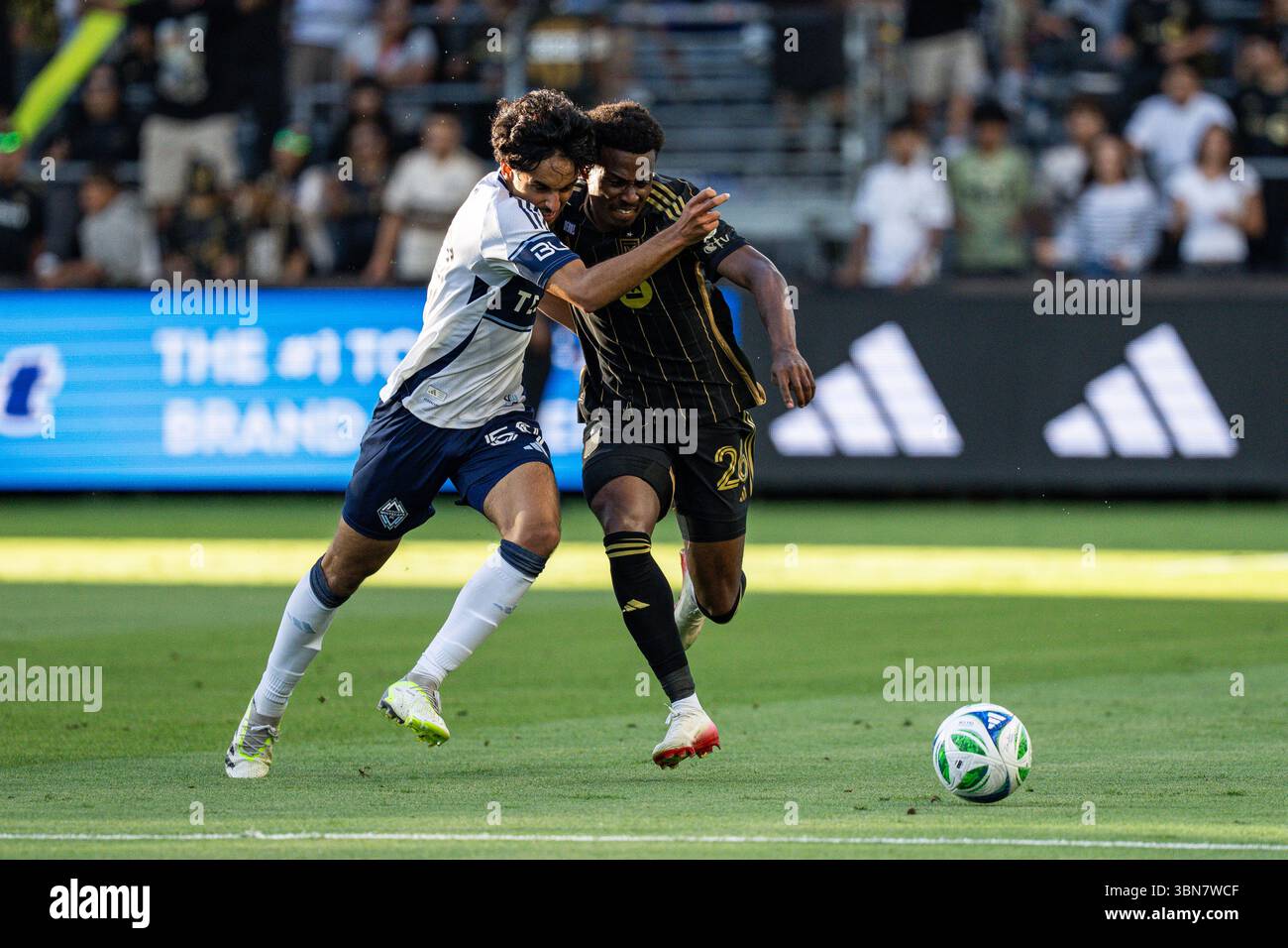 LAFC forward Javairô Dilrosun (26) and Vancouver Whitecaps midfielder ...