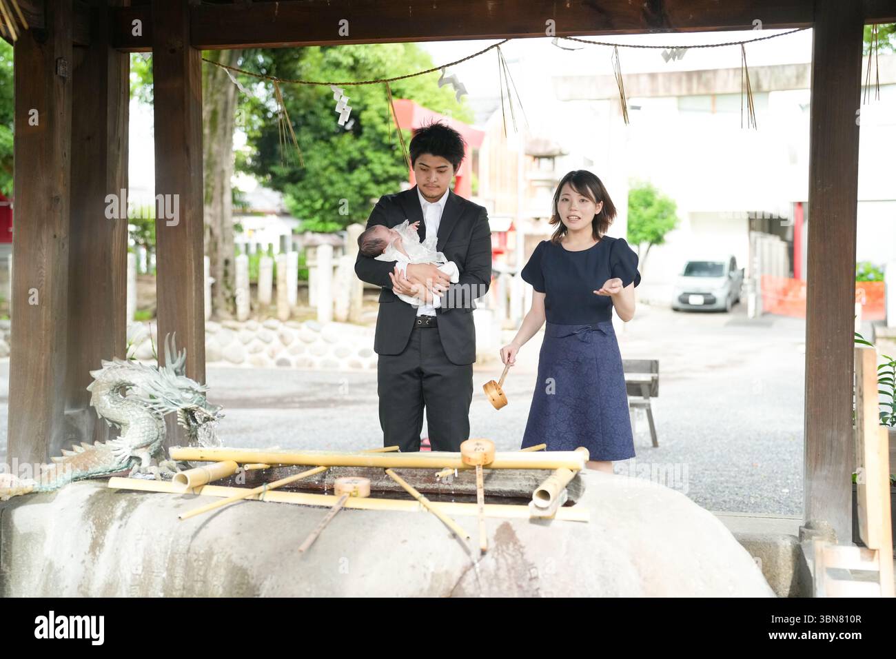 In June 2025, a young Japanese couple in their early twenties purifies ...