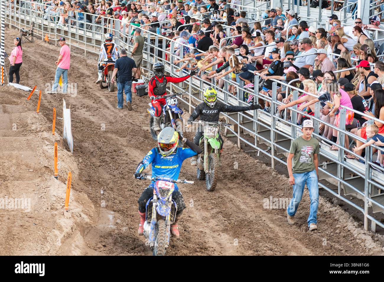 Nephi, Utah – June 28, 2025: Motocross riders greet fans while exiting ...