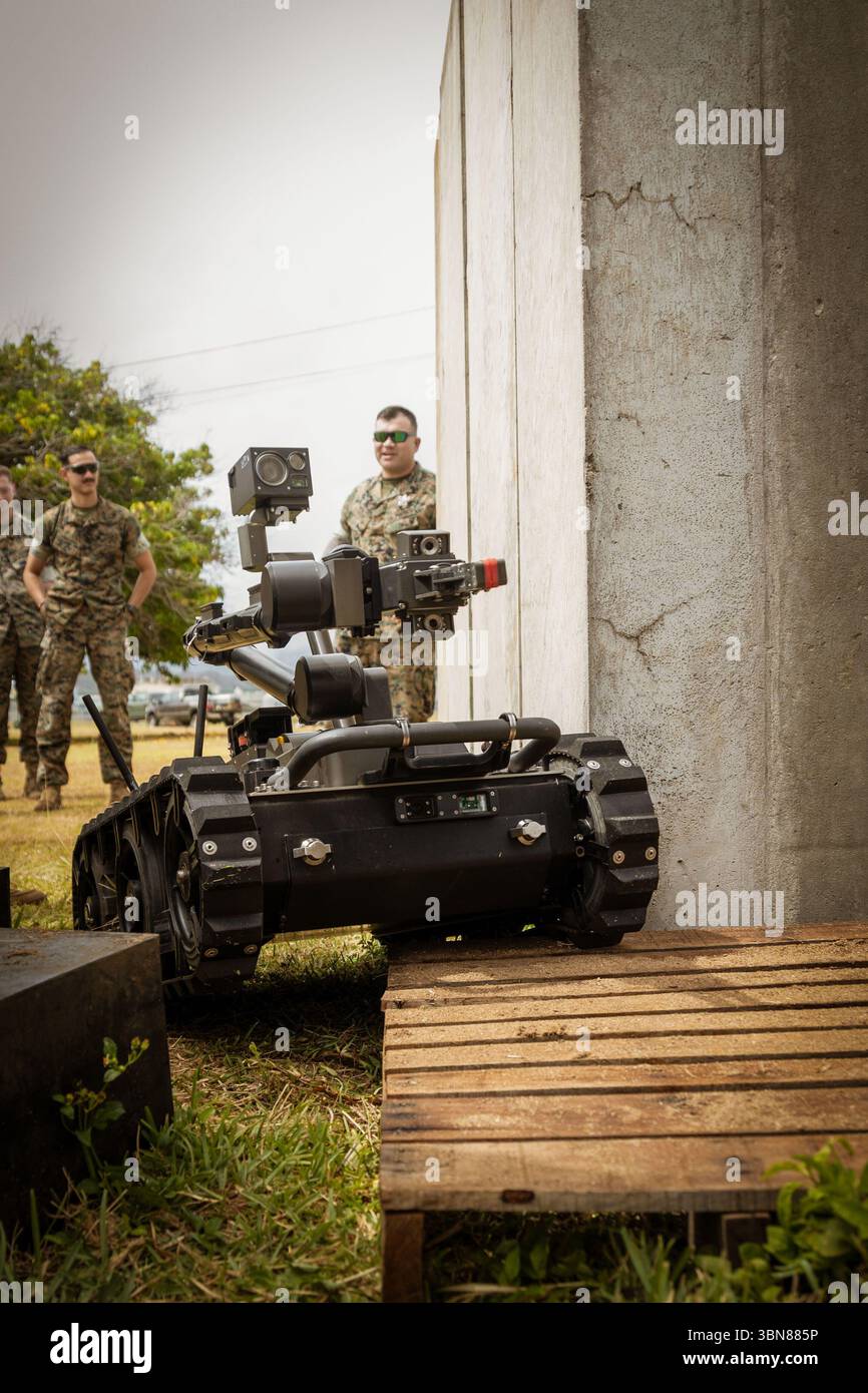 A U.S. Marine operates a Man Transportable Robotic System (MTRS) to ...