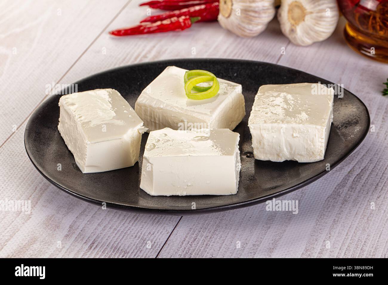 Greek traditional Feta cheese cubes for snack Stock Photo - Alamy