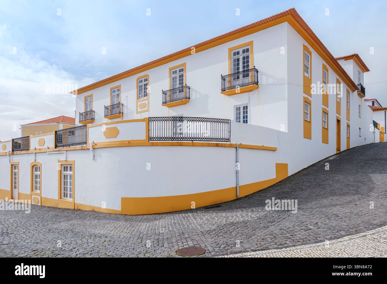 Elegant Portuguese Colonial Architecture With Yellow Trim and Iron ...