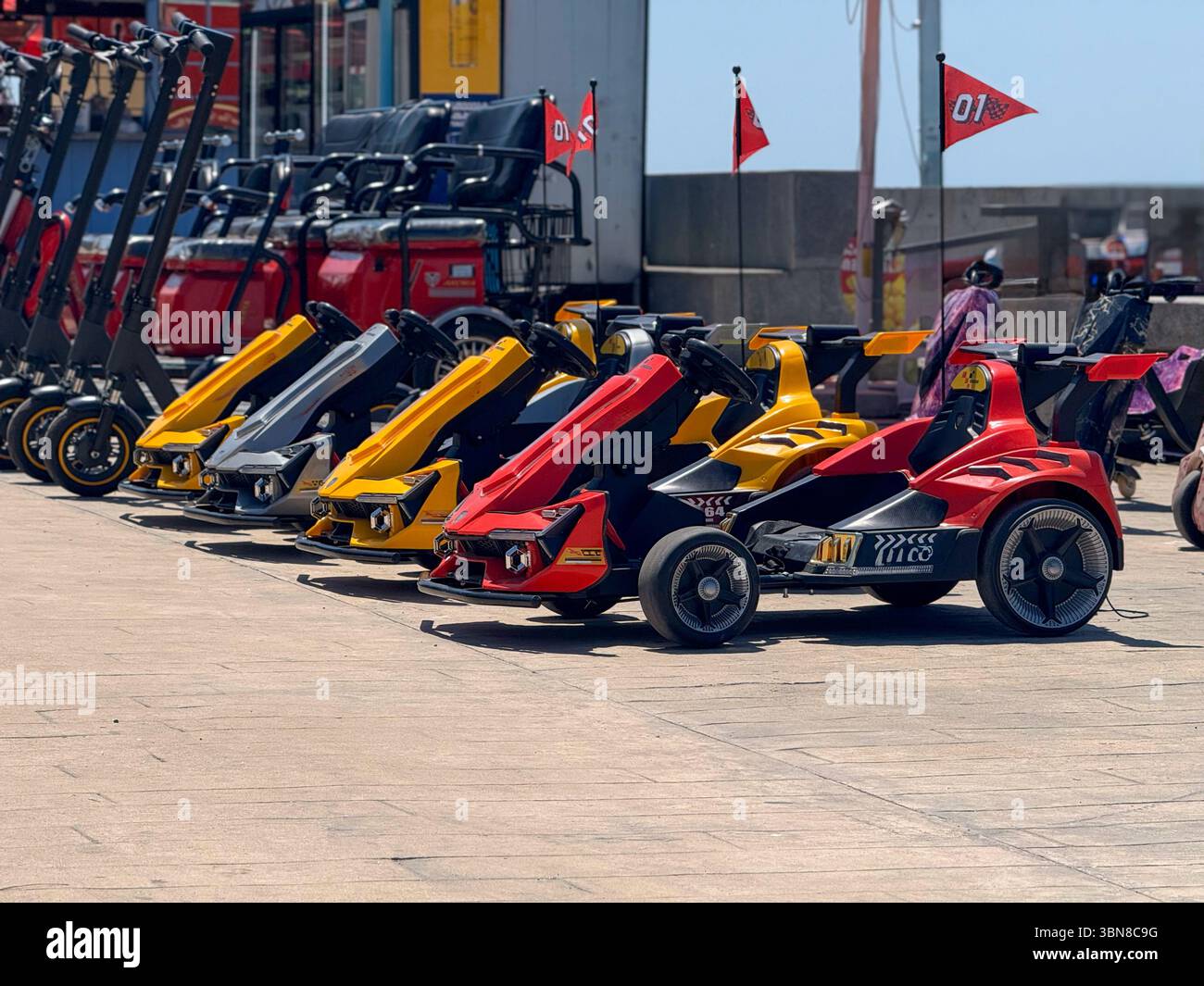Electric Go-Karts Lined Up for Adventure in Urban Recreational Zone ...