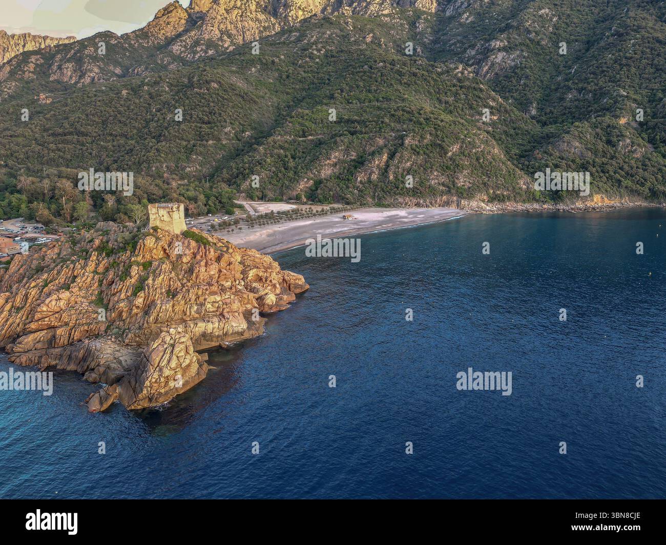 Aerial view town and ruins of the Genoese tower of Porto, Corsica ...