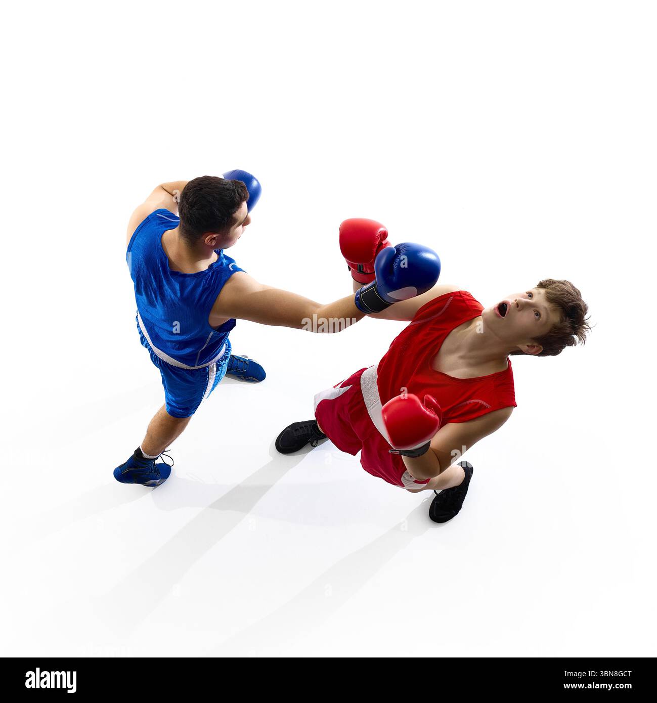 Boxing match action shot capturing dynamic punch from above perspective ...