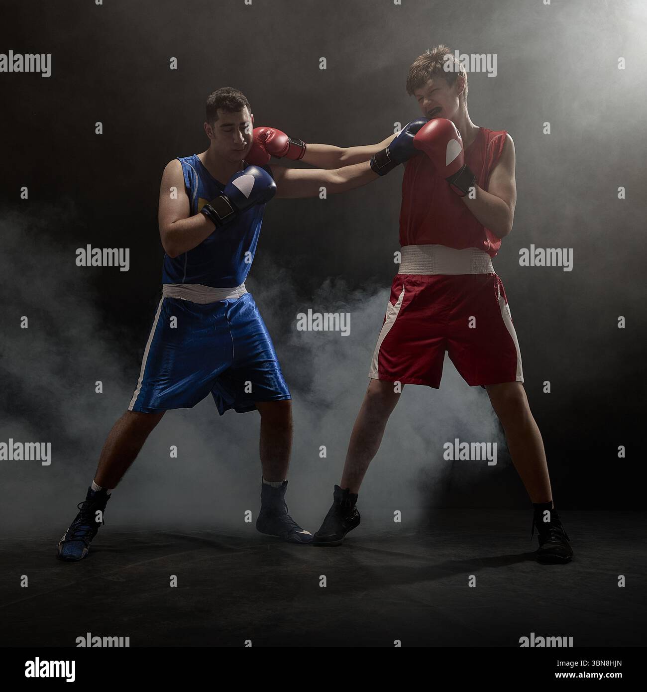 Boxers facing off in ring hi-res stock photography and images - Alamy