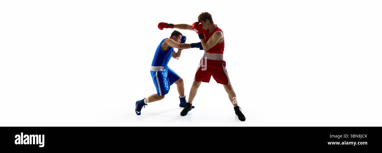 Boxers in intense action with punch and defensive guard on white ...