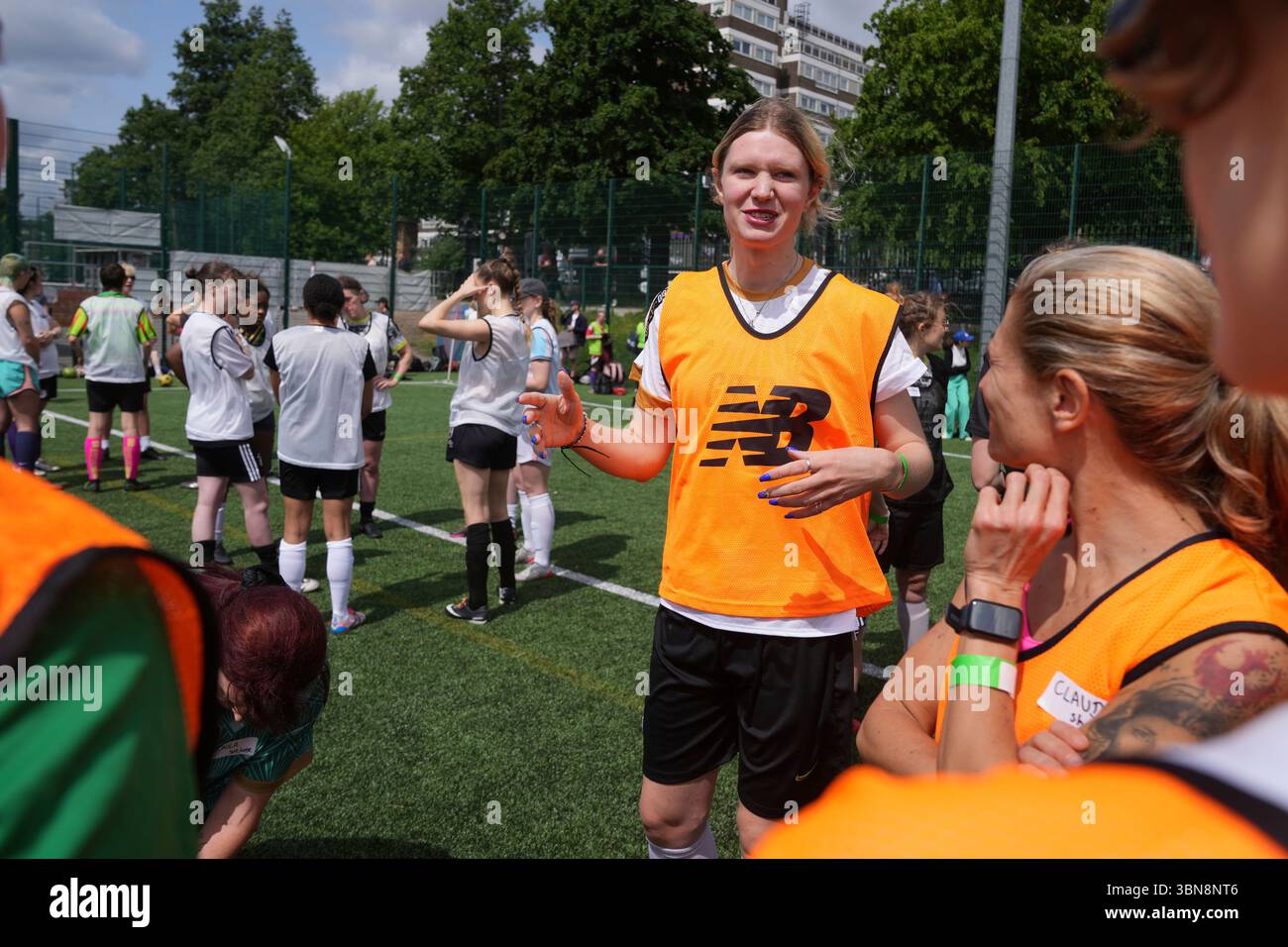 Billie Sky, center, a 28-year-old transgender player for Goal Diggers ...