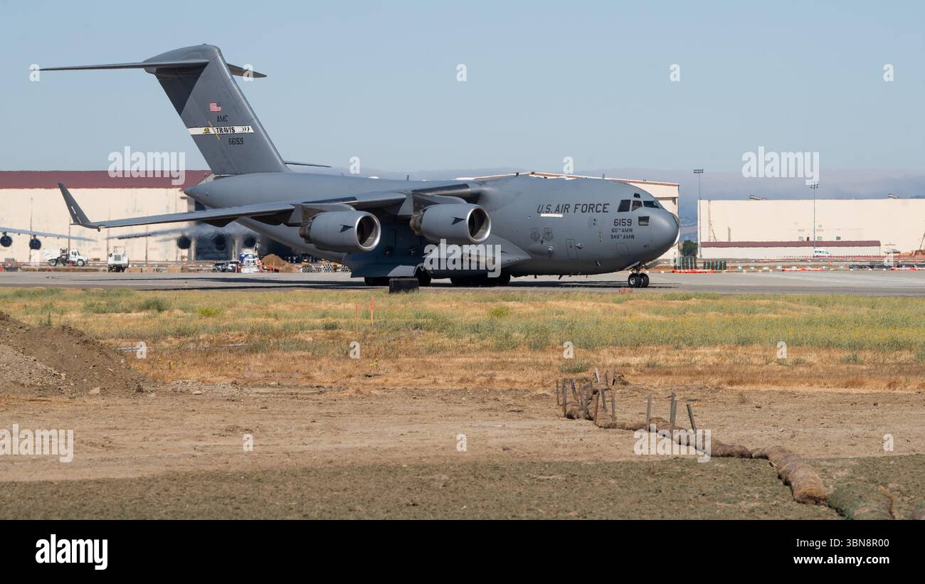 A U.S. Air Force C-17 Globemaster III assigned to the 21st Airlift ...