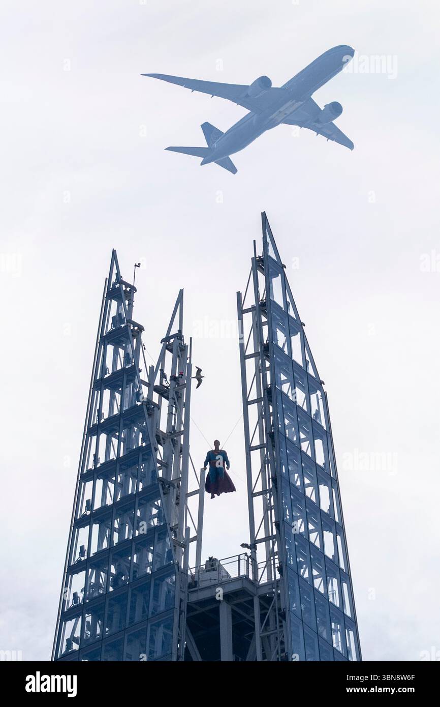 London, UK. 1 July 2025. A bird and aircraft fly past the life-like ...