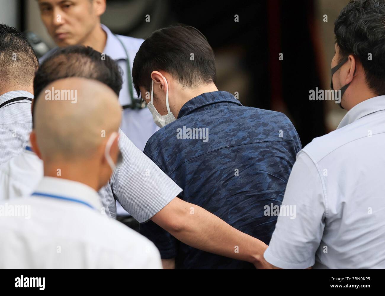 Suspect Reito Watanabe enters Sugamo Police Station of the Metropolitan ...