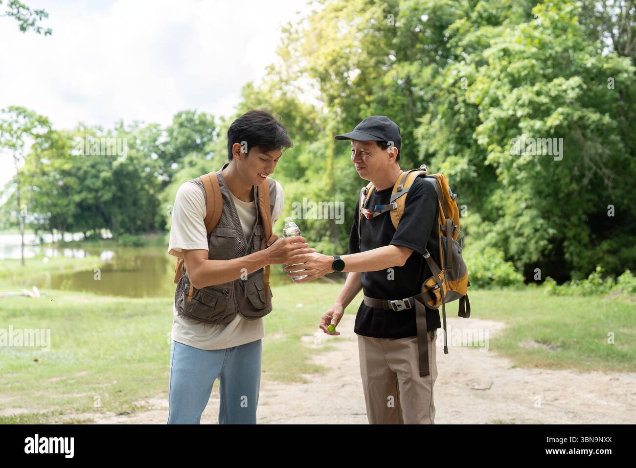 Father and Son Hiking Adventure. Two men enjoying nature while ...