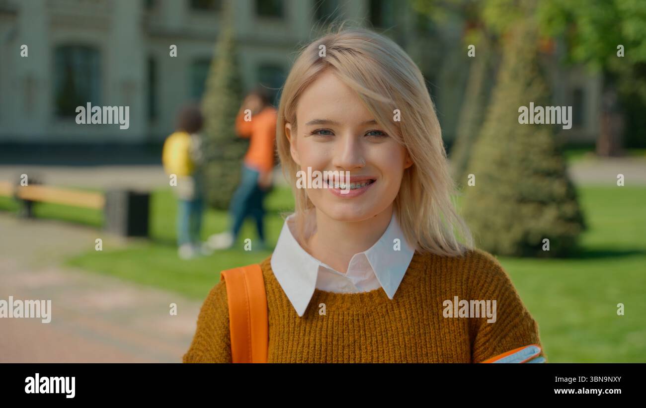 Portrait happy smiling positive Caucasian woman female student girl ...
