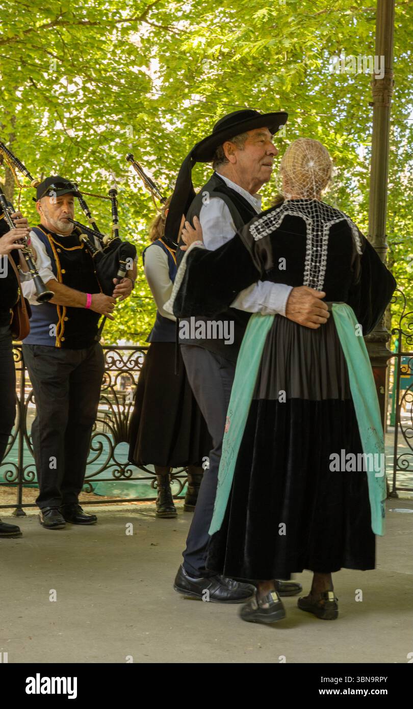 Bagpipe players and traditional folk dancers exhibit their skills on ...